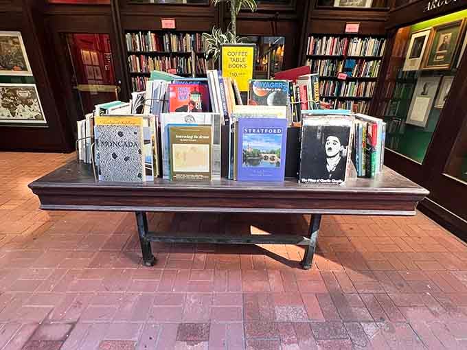 Coffee table books rest on an elegant display table, ready to make your living room look infinitely more cultured.