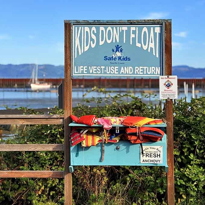 Free life vests for kids line the waterfront, because apparently children don't float and someone thought ahead.
