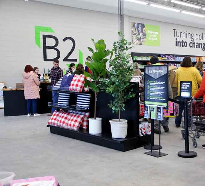 The checkout counter beckons with potted plants and gingham pillows, making even paying feel like a pleasant experience.