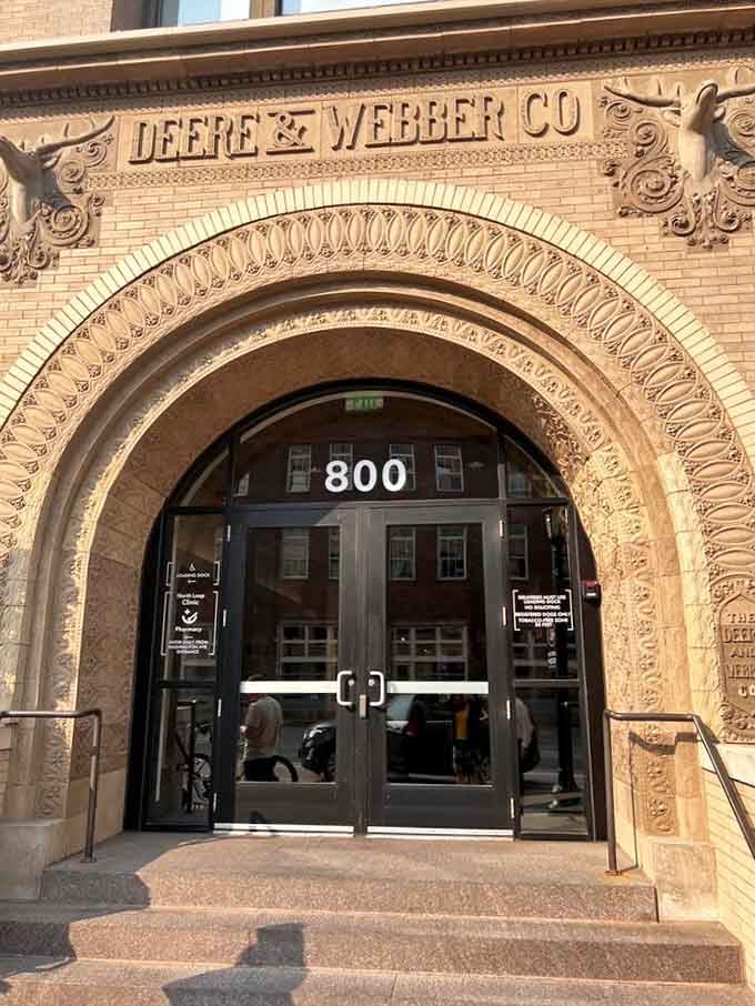 The Deere & Webber Co. archway entrance, where history meets hungry people seeking their next favorite meal.