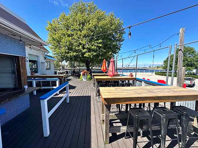 The outdoor deck where you can enjoy your meal with water views, fresh air, and the satisfaction of excellent life choices.