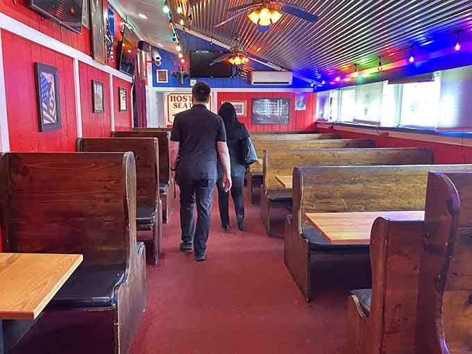 Rows of booths stretching toward the kitchen promise plenty of room for hungry barbecue lovers.