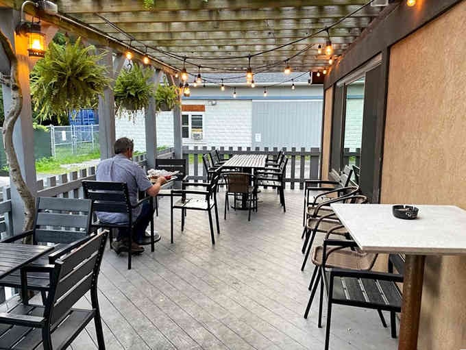The covered patio offers fresh air dining where you can enjoy your meal under twinkling lights year-round.