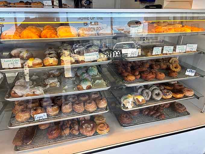 Display cases packed with fresh-baked temptation, organized chaos that somehow makes choosing both easier and harder simultaneously.