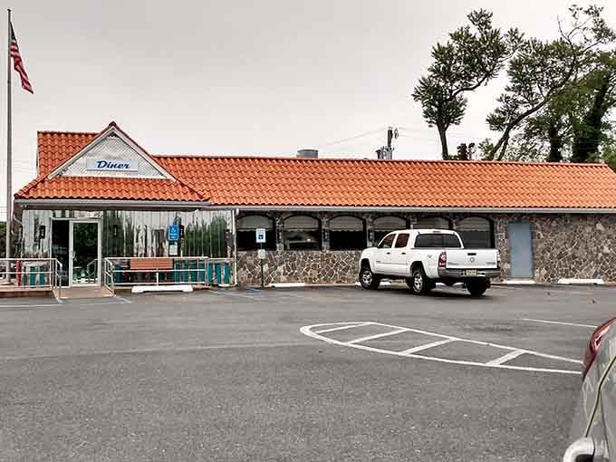 Golden Pigeon Diner's classic exterior promises the kind of honest breakfast that doesn't require a small loan.