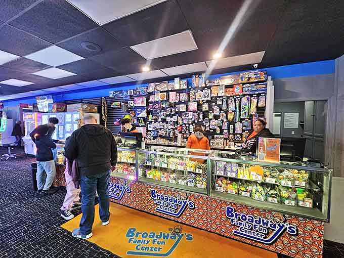 The prize counter displays its treasures like a museum exhibit dedicated to the art of ticket accumulation and childhood dreams.