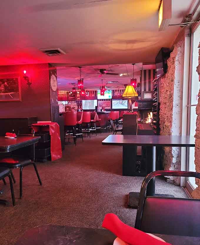 More intimate dining spaces bathed in that signature red glow make every meal feel like a special occasion.