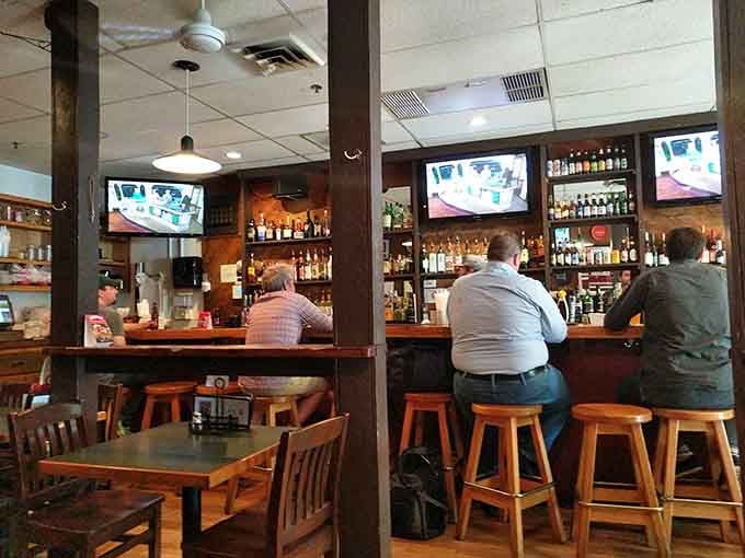 The well-stocked bar offers plenty of beverage options to complement whatever wing sauce adventure you're embarking on.