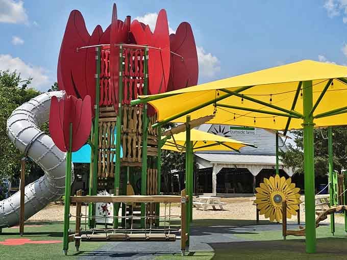 A playground designed like a giant tulip because apparently regular slides just weren't whimsical enough for this place.