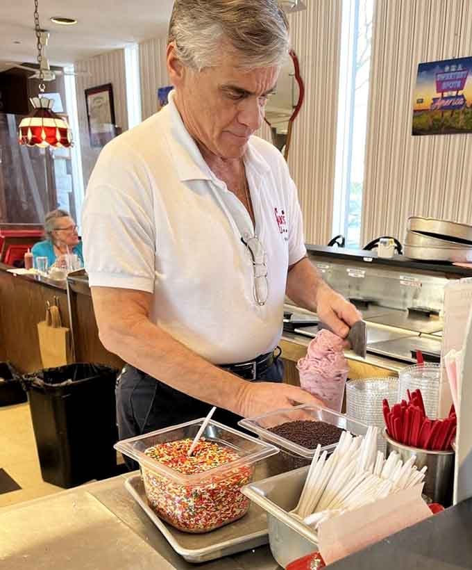 The staff here craft sundaes with the precision of surgeons and the enthusiasm of artists creating edible masterpieces.