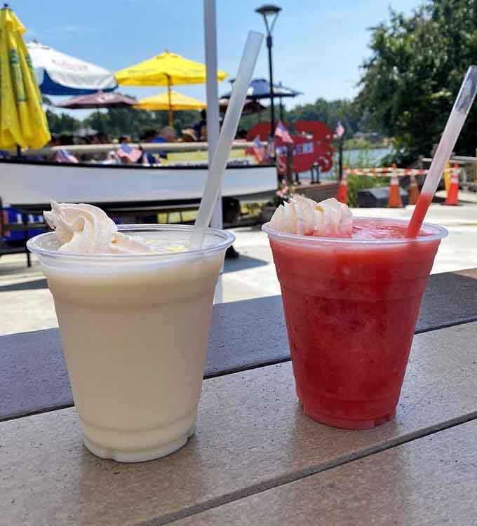 Frozen drinks catching rays by the water, because sometimes your beverage deserves a vacation too, right?