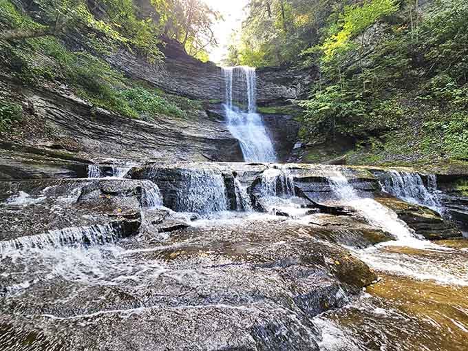 Multiple cascades tumbling over layered rock shelves create a symphony of water that no playlist can compete with.