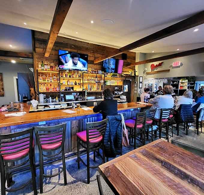 The bar area is perfect for catching the game while enjoying craft cocktails and excellent barbecue simultaneously.