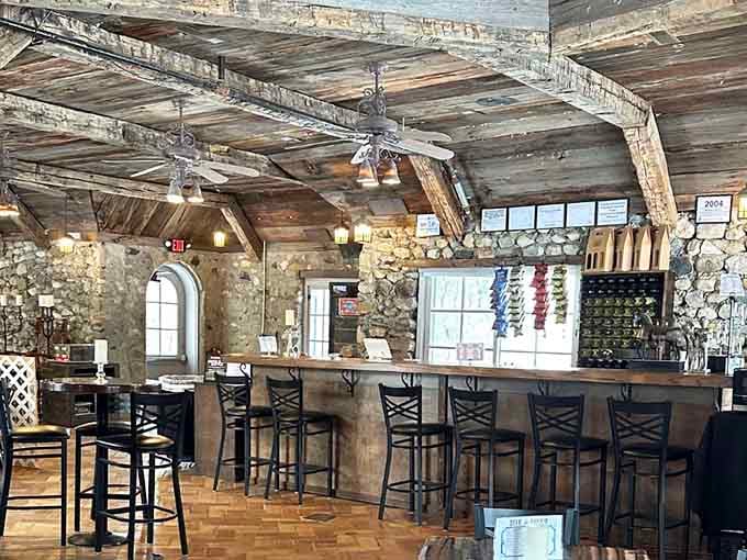 The Castle Pub combines rustic beams with stone walls, creating the coziest spot for wine tasting imaginable.