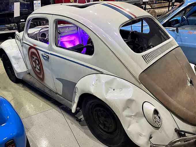 Herbie the Love Bug sits waiting, that famous number 53 still visible on weathered paint.