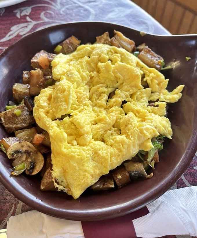 That veggie skillet topped with fluffy scrambled eggs is proof healthy eating doesn't have to be boring or bland.