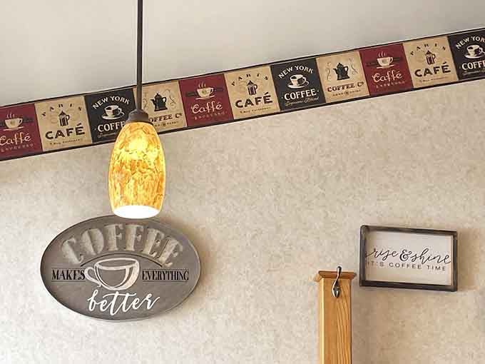 Coffee-themed decor and warm pendant lighting remind you that great diners understand atmosphere matters as much as food.