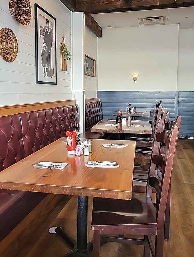 Cozy booths and rustic touches create the kind of comfortable atmosphere where time slows down pleasantly.