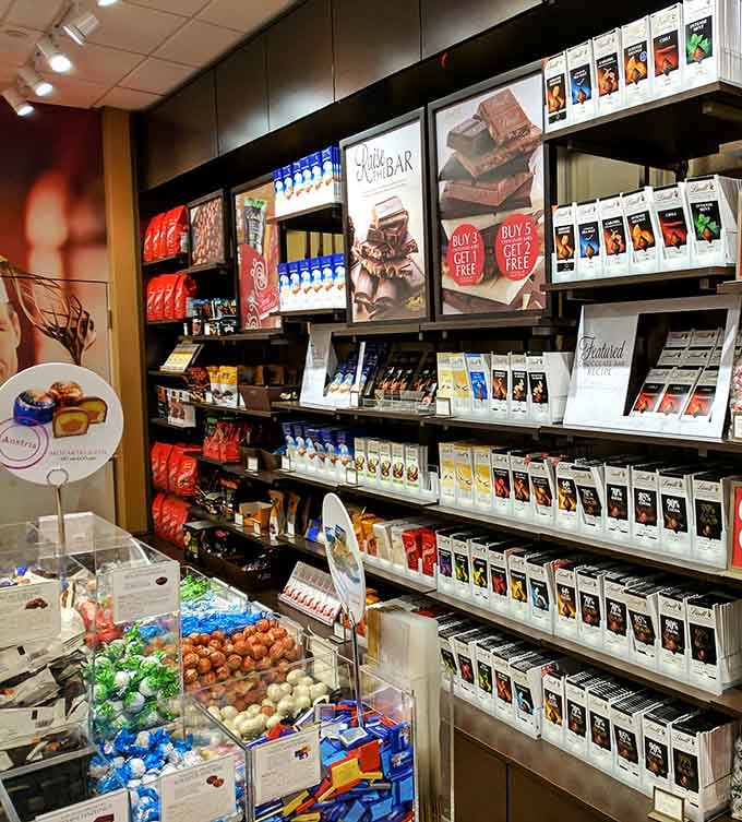 The chocolate shop stands ready to reward your shopping efforts with sweet treats that justify all those walking calories.