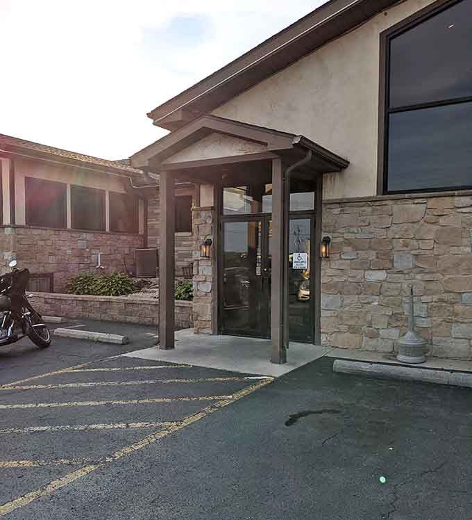 The covered entrance welcomes you like an old friend, promising good things await just inside.