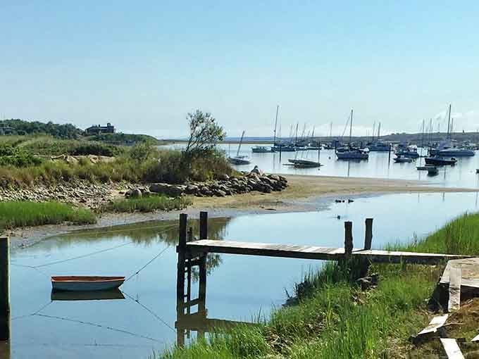 A single rowboat and a weathered dock: the complete Cuttyhunk marina starter pack.