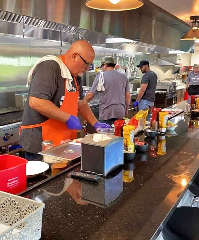 The hardworking kitchen crew making all your comfort food dreams come true one plate at a time.