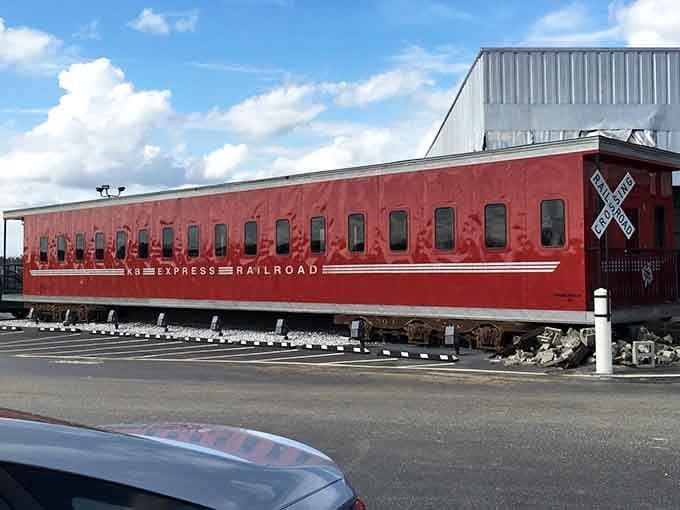 The Express Railroad car sitting outside like it's been waiting for passengers who are actually just hungry for lunch instead.