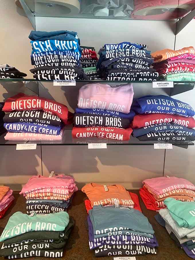 Colorful sweatshirts stacked neatly let you wear your love for this place proudly, like a badge of excellent taste.