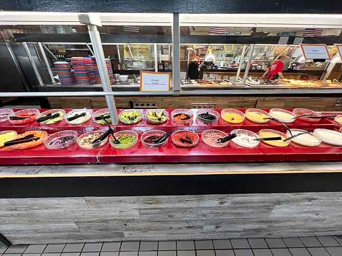 The salad bar offers fresh toppings and dressings for those brief moments when you're pretending to be healthy.