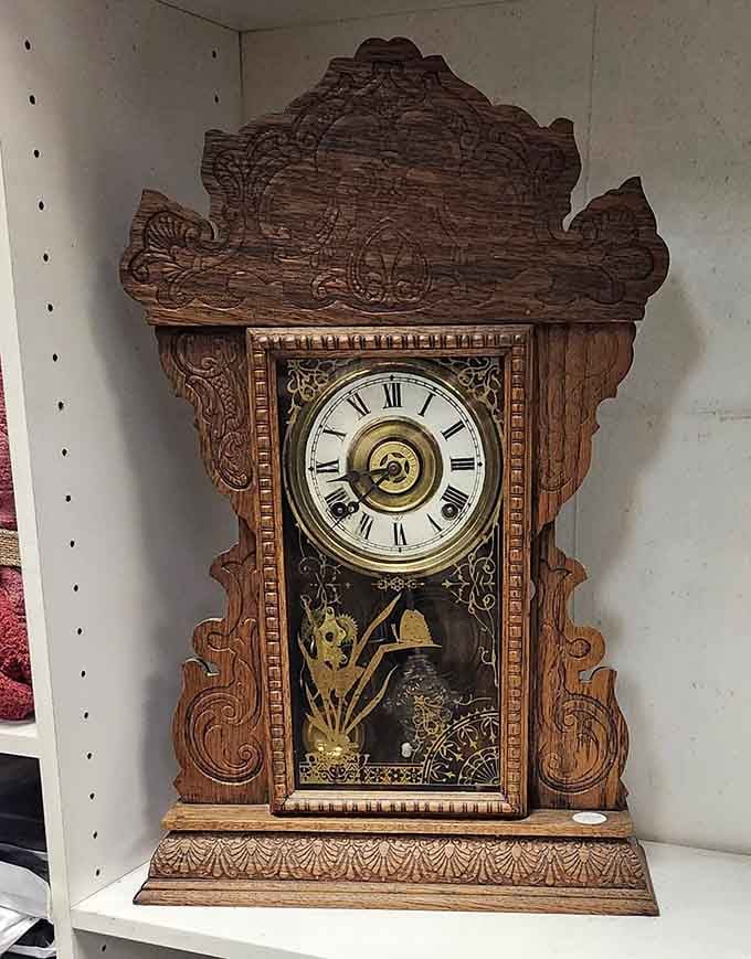 An intricately carved antique clock that's seen more decades than most of us, still keeping time.