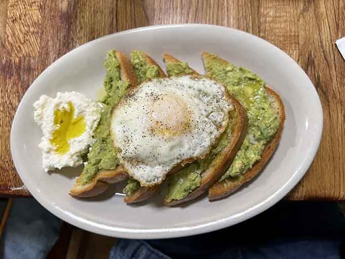 Avocado toast elevated with an egg, because even trendy breakfast items deserve the Doozy's treatment.