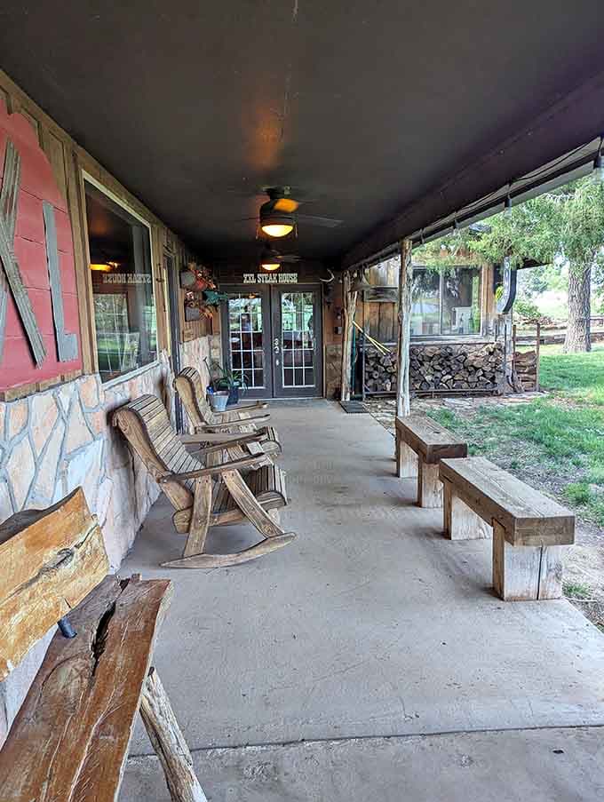 Rocking chairs and rustic benches on the porch invite you to sit a spell before or after your feast, true ranch style.