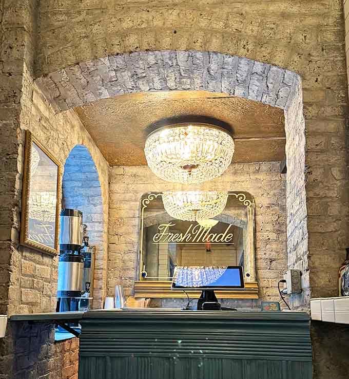 Crystal chandeliers and fresh-baked doughnuts prove that elegance and indulgence can absolutely coexist in perfect harmony here.