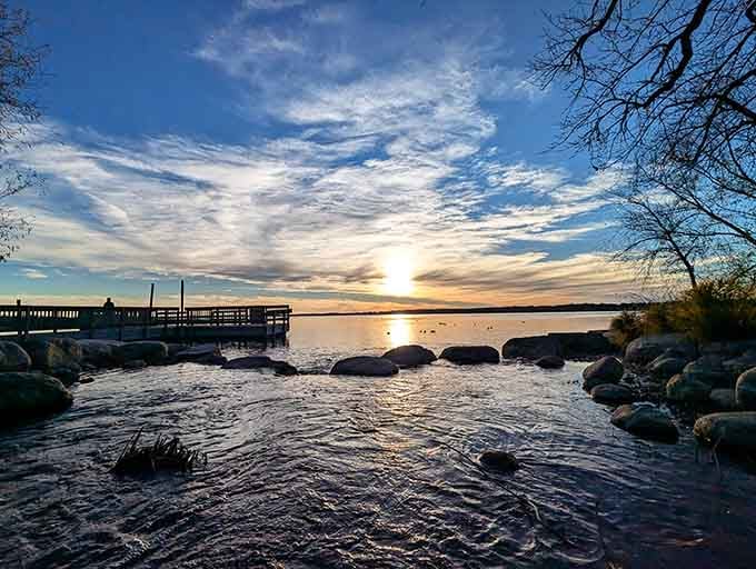 Sunrise over the channel paints the sky in colors that would make Bob Ross reach for extra brushes.