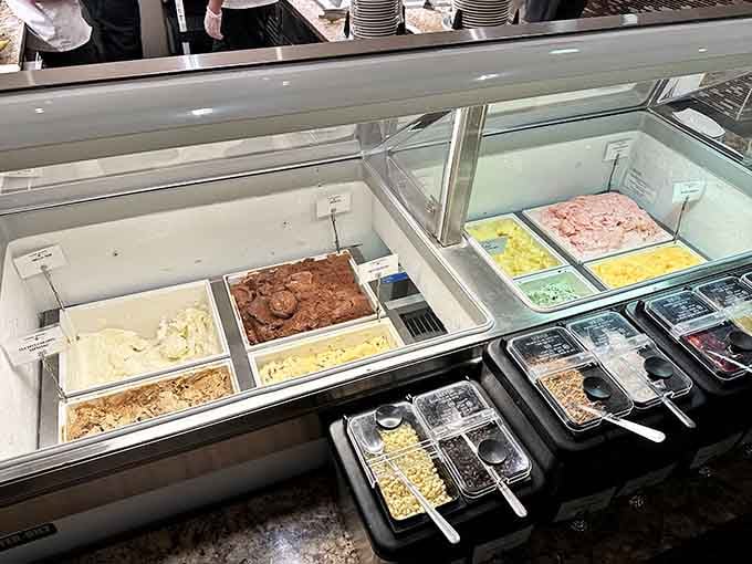 Ice cream flavors in rainbow colors turn grown adults into excited children planning their next sundae masterpiece.