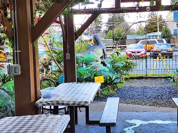Outdoor seating with dinosaurs standing guard, making every meal feel like an adventure worth taking.