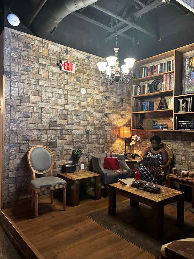 A cozy corner with a chandelier and bookshelves where you can pretend you're in someone's impossibly cool living room.