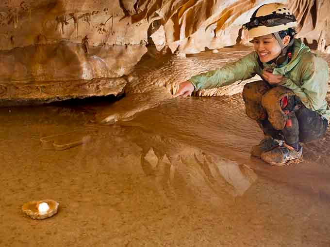 Underground pools reflect the cave's beauty, offering moments of tranquility in this otherworldly landscape below Georgia.