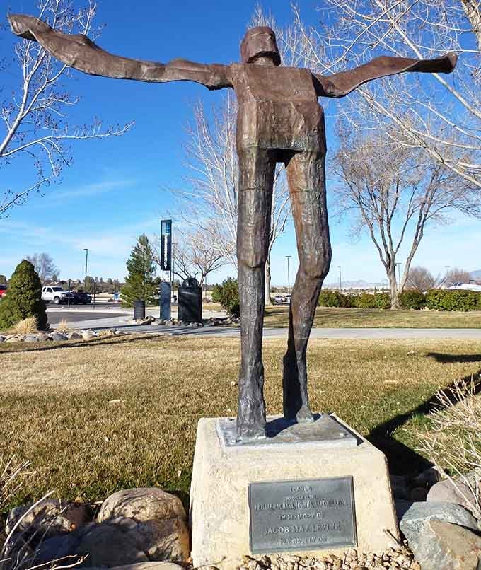 The Icarus statue reaches skyward, a fitting tribute to humanity's eternal dream of conquering the heavens.