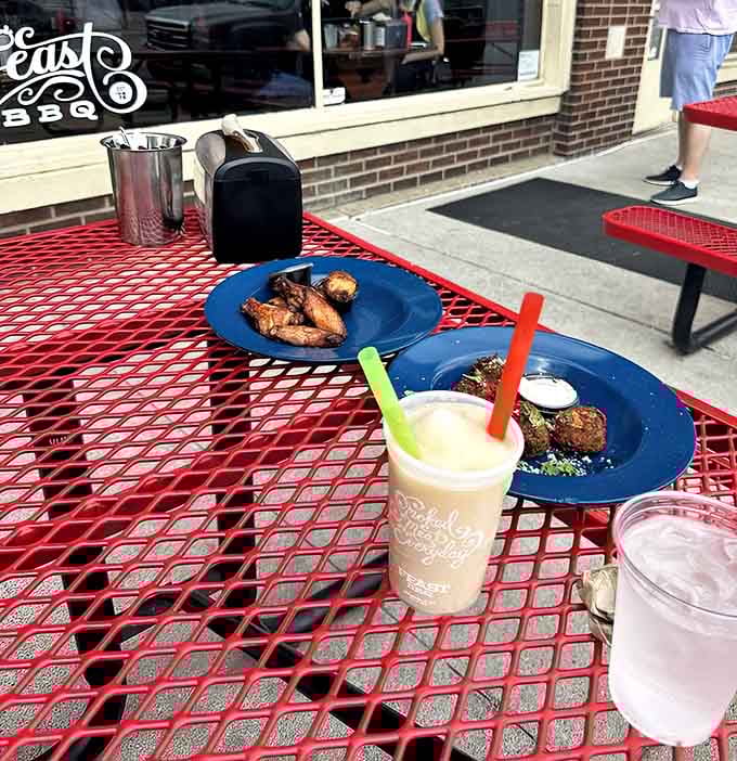Those red picnic tables outside are calling your name on sunny days when barbecue tastes even better.