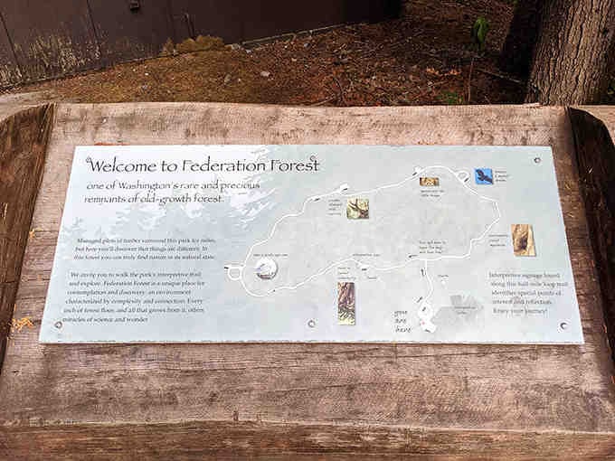 This welcome sign understands what matters: helping visitors appreciate rare old-growth forest before it becomes a memory.