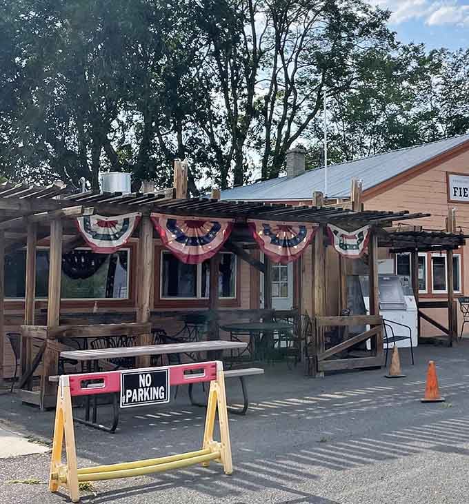 Patriotic bunting decorates outdoor seating where you can enjoy your meal under the high desert sky.