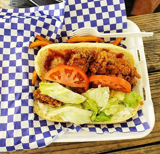 This oyster po'boy is stuffed so full that closing it seems like an engineering challenge worth attempting anyway.