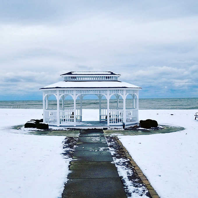 Winter transforms the gazebo into a snow globe scene, proving this park's beauty transcends every season.