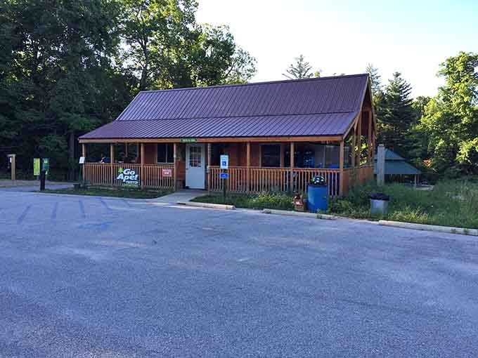 The rustic check-in building welcomes visitors to gear up and prepare for their forest canopy adventure.