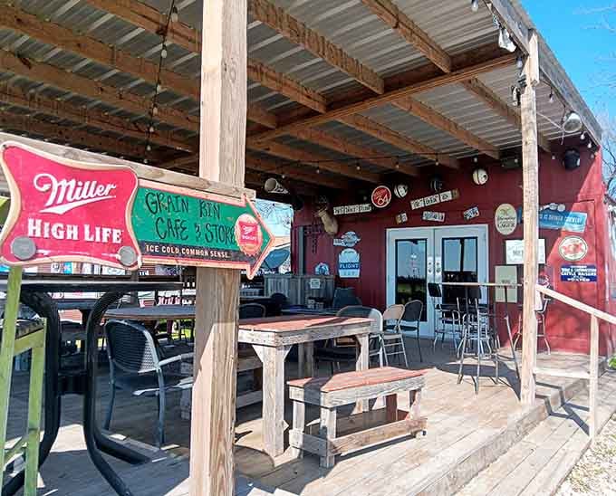 The outdoor patio adorned with vintage beer signs offers a laid-back spot to savor your meal properly.