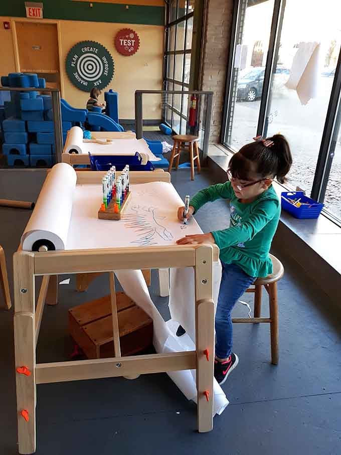 Creativity stations with endless paper rolls let budding artists sketch masterpieces without parents worrying about marked-up walls at home.
