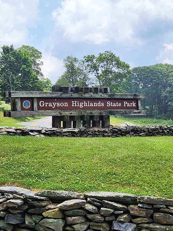 The entrance sign welcoming you to a place where wild ponies roam and mountain air clears your head better than caffeine.