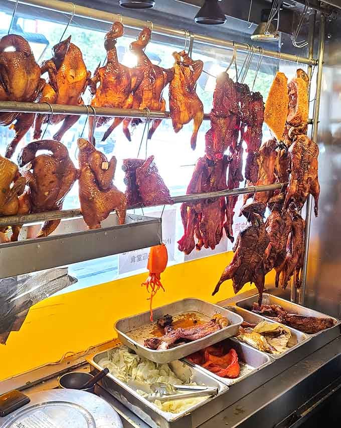 This window display of hanging ducks and chickens is basically Chinatown's version of fine art.