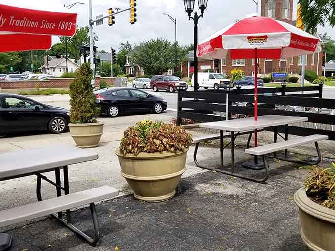 Picnic tables provide the perfect setting for tackling sandwiches that require both hands and determination.